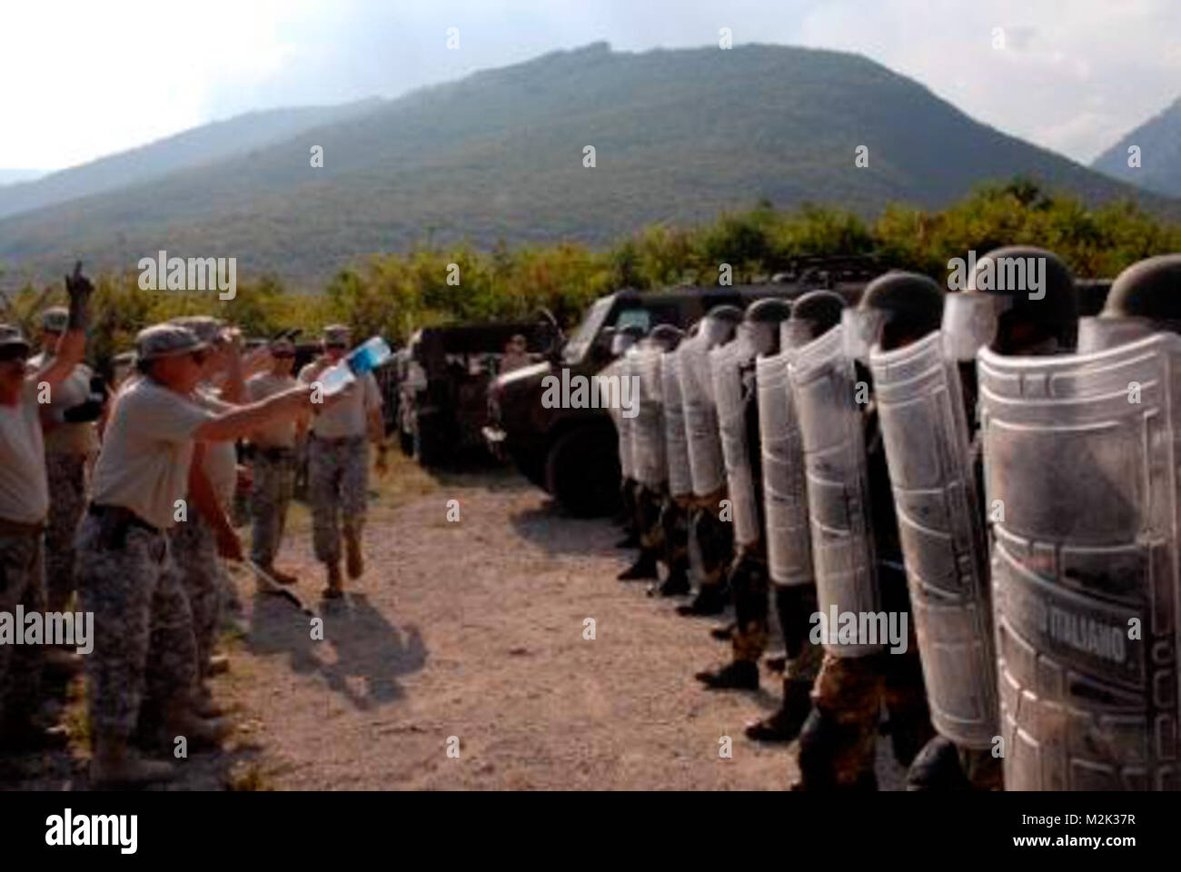 Soldiers from A Company, 1st Battalion, 296th Infantry Regiment, face ...