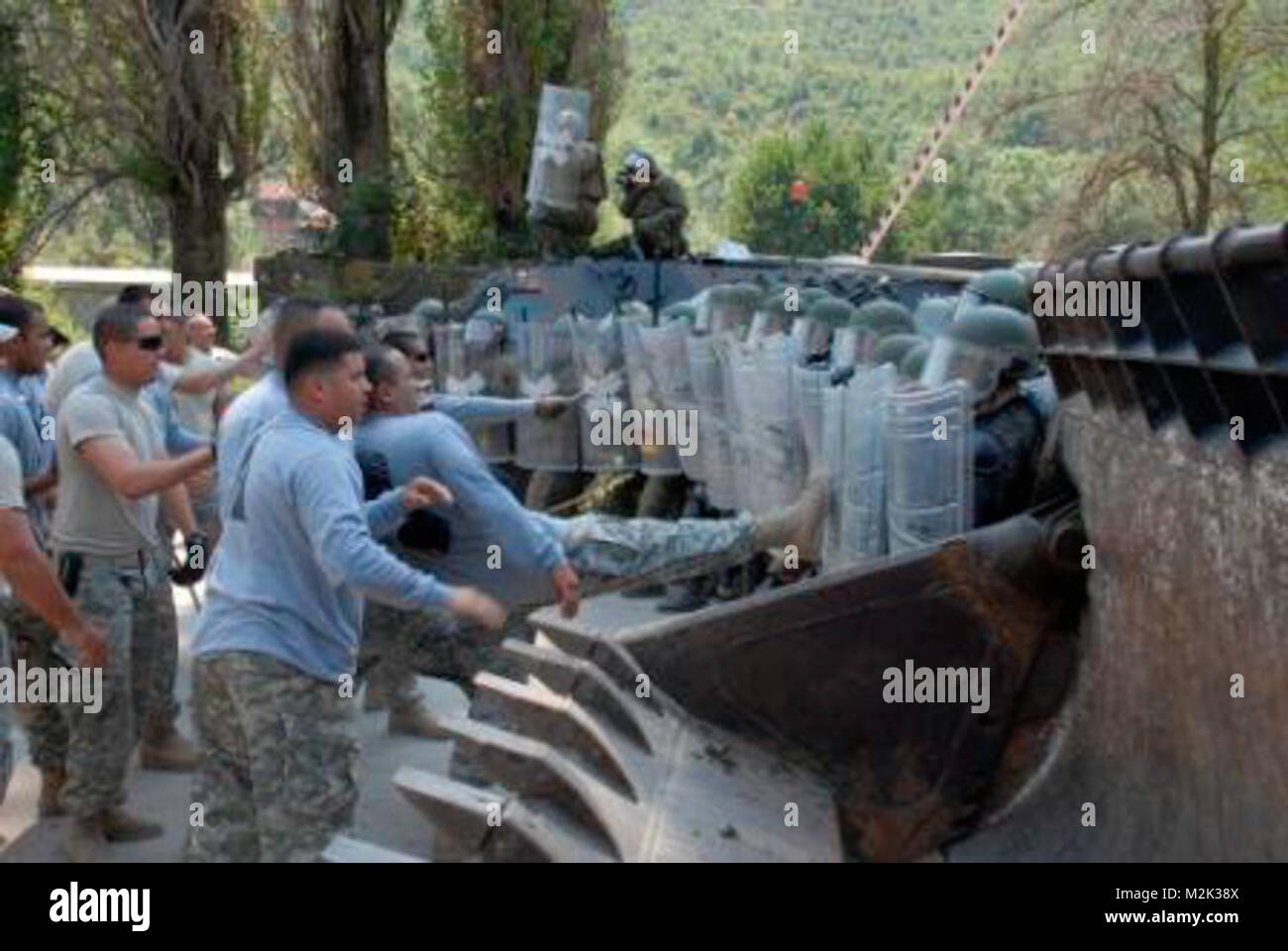 Soldiers from A Company, 1st Battalion, 296th Infantry Regiment, fight ...