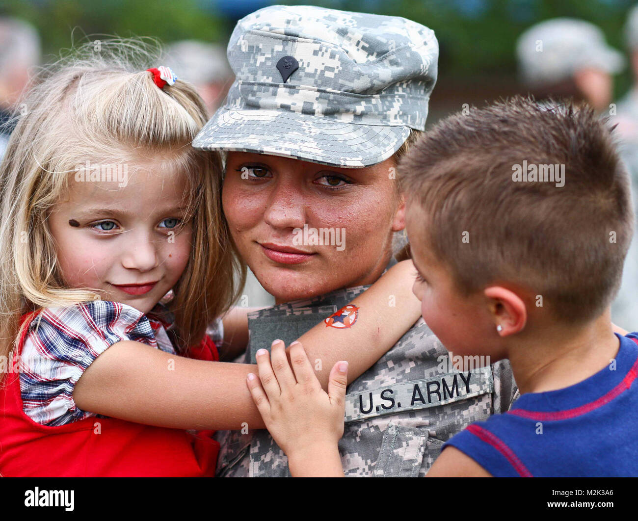 Spc. Alicia Greer of the 838th Military Police Company holds her 5-year ...