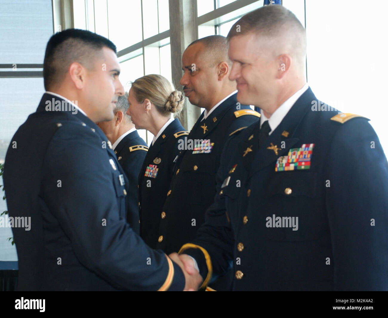 A Congratulatory Handshake by Texas Military Department Stock Photo - Alamy