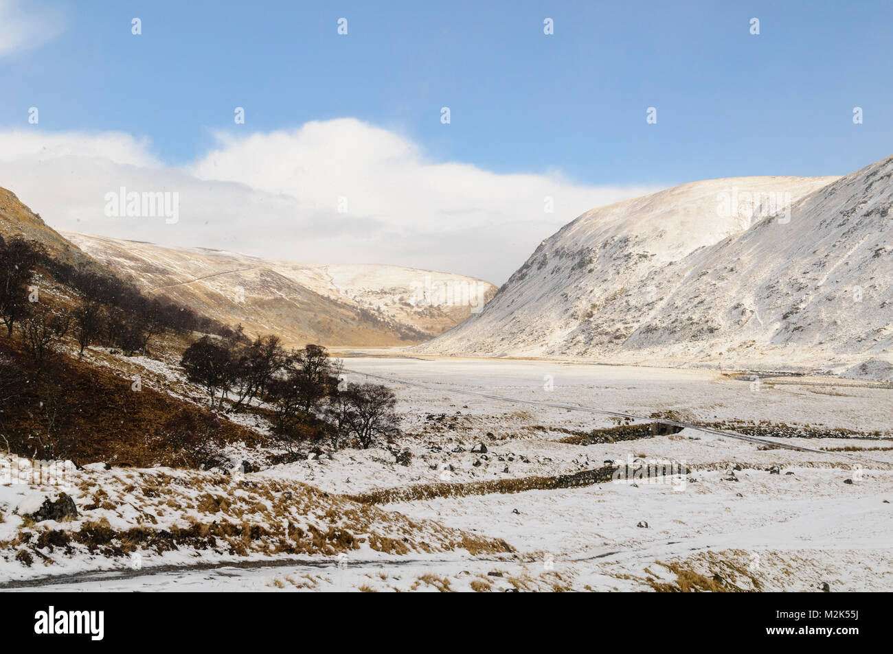 A view of the upper Findhorn valley below the snow-covered Monadhliath ...