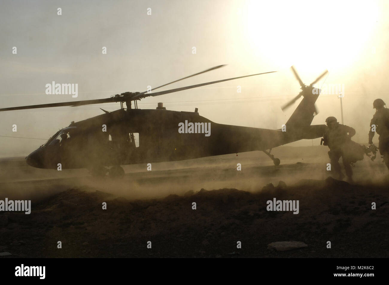 MONFIA, Iraq -- United States Army Spc. Russell Coffey (right) and Air ...