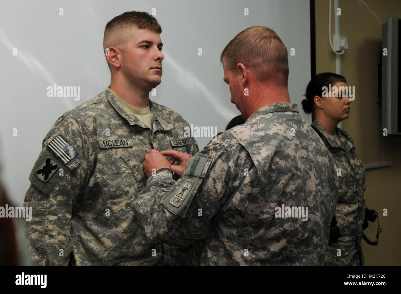Sergeant Major of the Army pins of the rank of Sergeant to Spc. Cody M ...