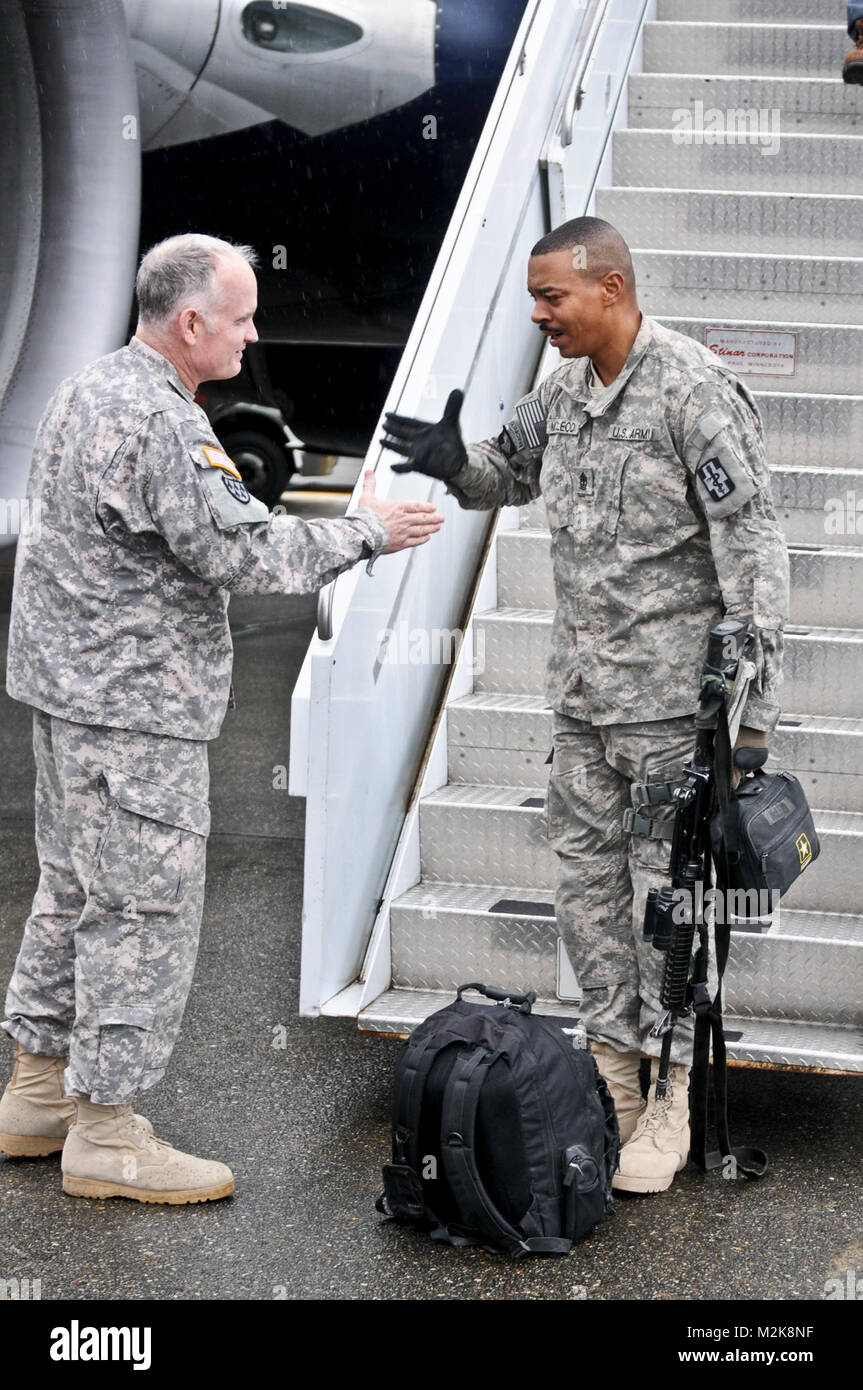 Maj. Gen. Charles A. Anderson greets 1st Sgt. James McLeod from the ...