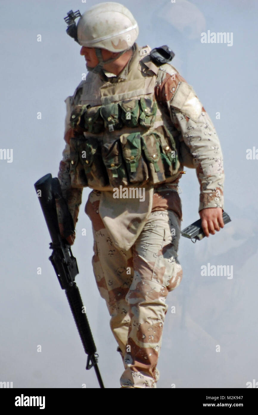 Army soldier military walking smoke war hi-res stock photography and ...