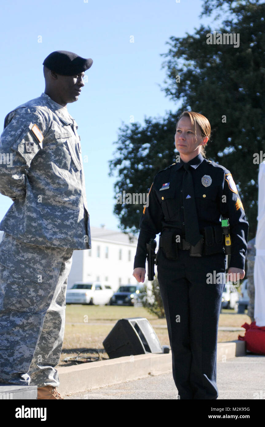 FORT HOOD, Texas -- Officer Kimberly Munley awaits her turn to receive ...