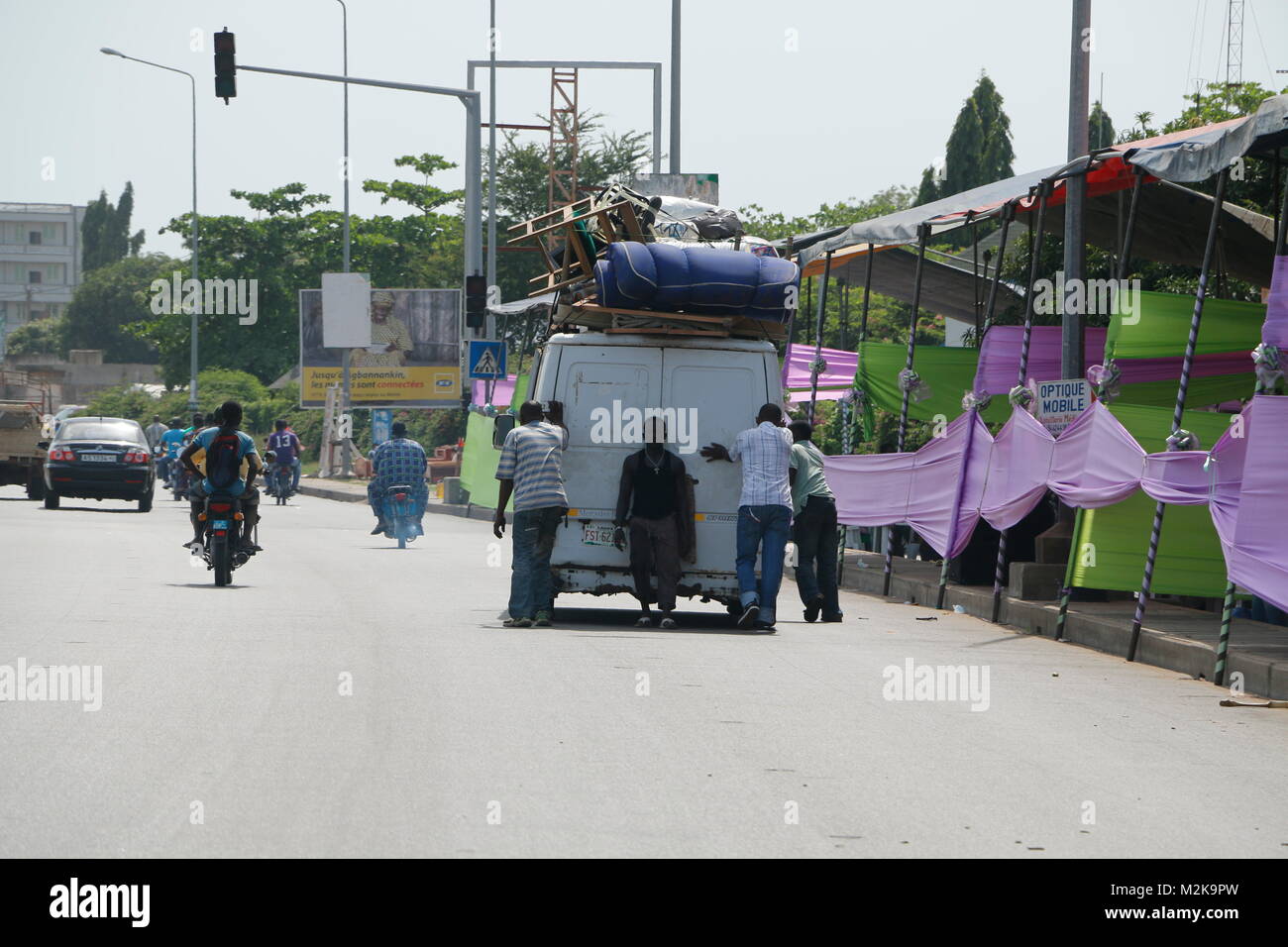 overloaded cars mostly with goods to sell at the market Stock Photo - Alamy