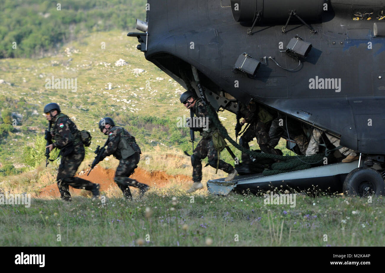 Special operations soldiers from Hungary depart from an U.S. Army MH-47 ...