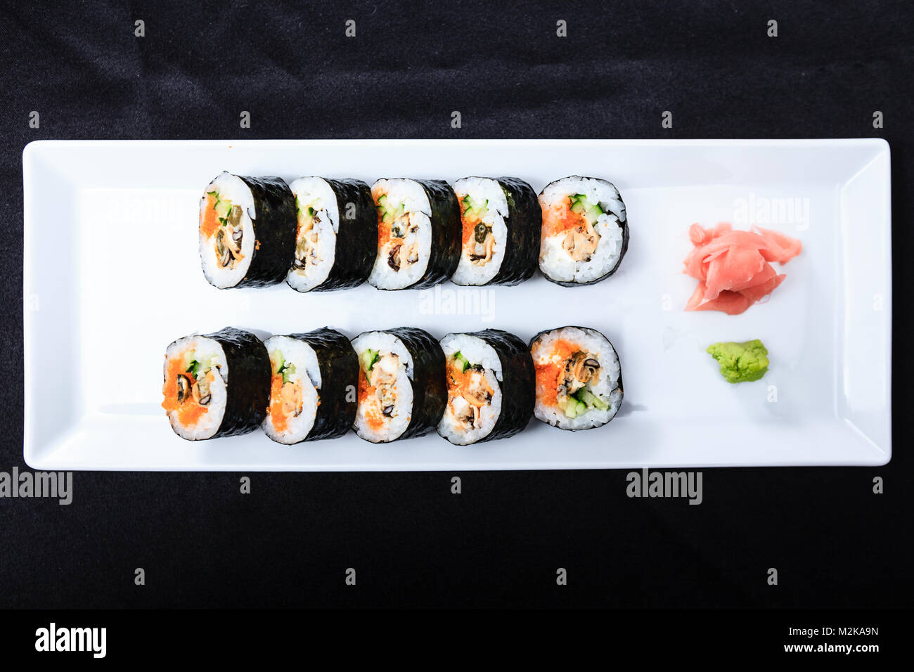 Seashell roll served on a plate Stock Photo - Alamy
