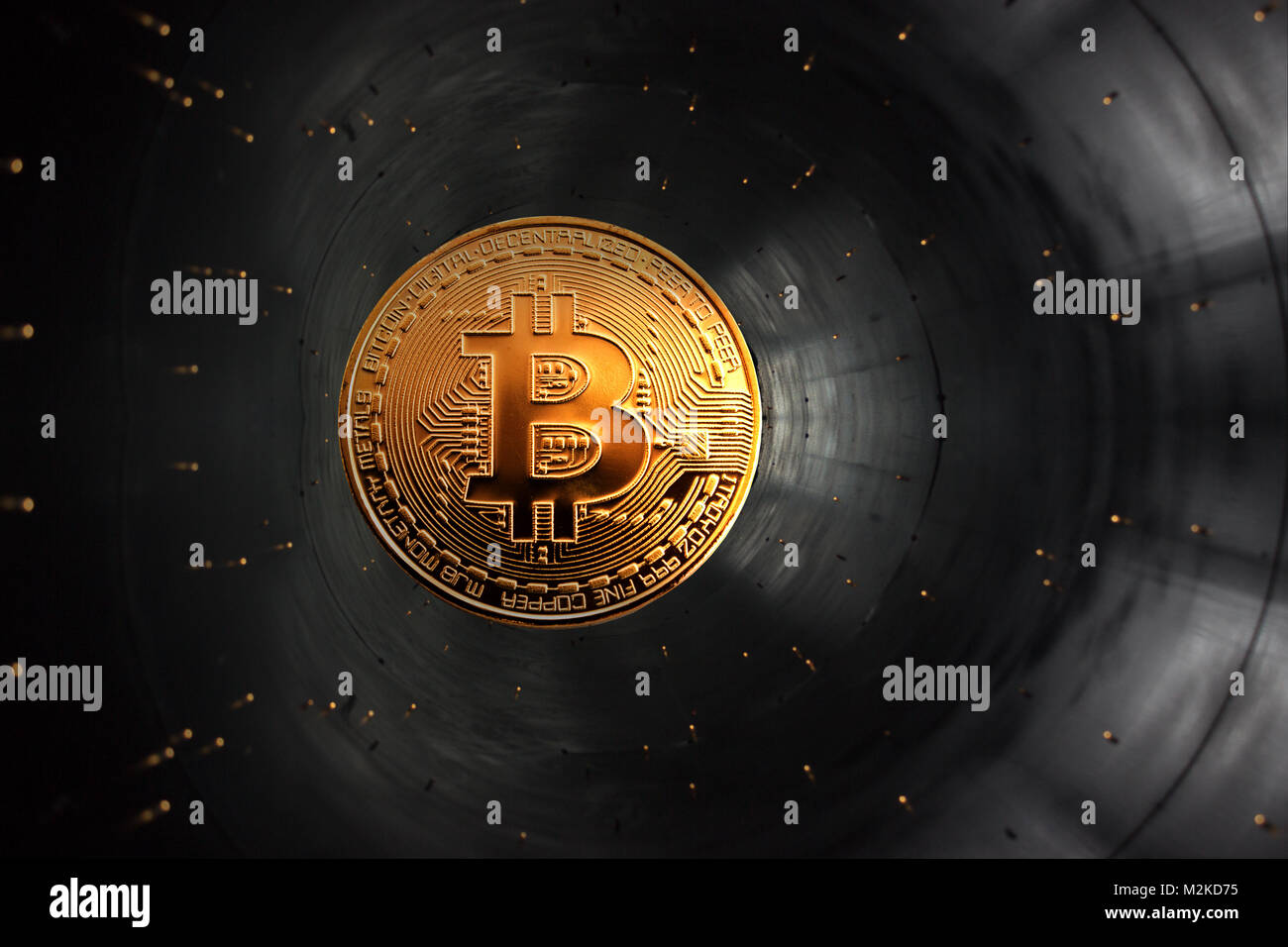 On a gray background in accelerator is gold coin of a virtual digital ...