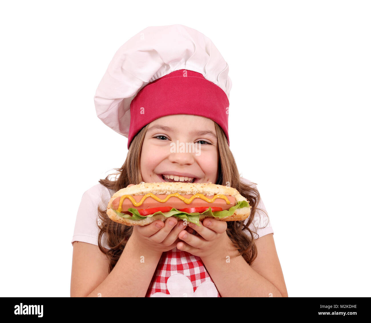 happy little girl cook with hot dog Stock Photo - Alamy