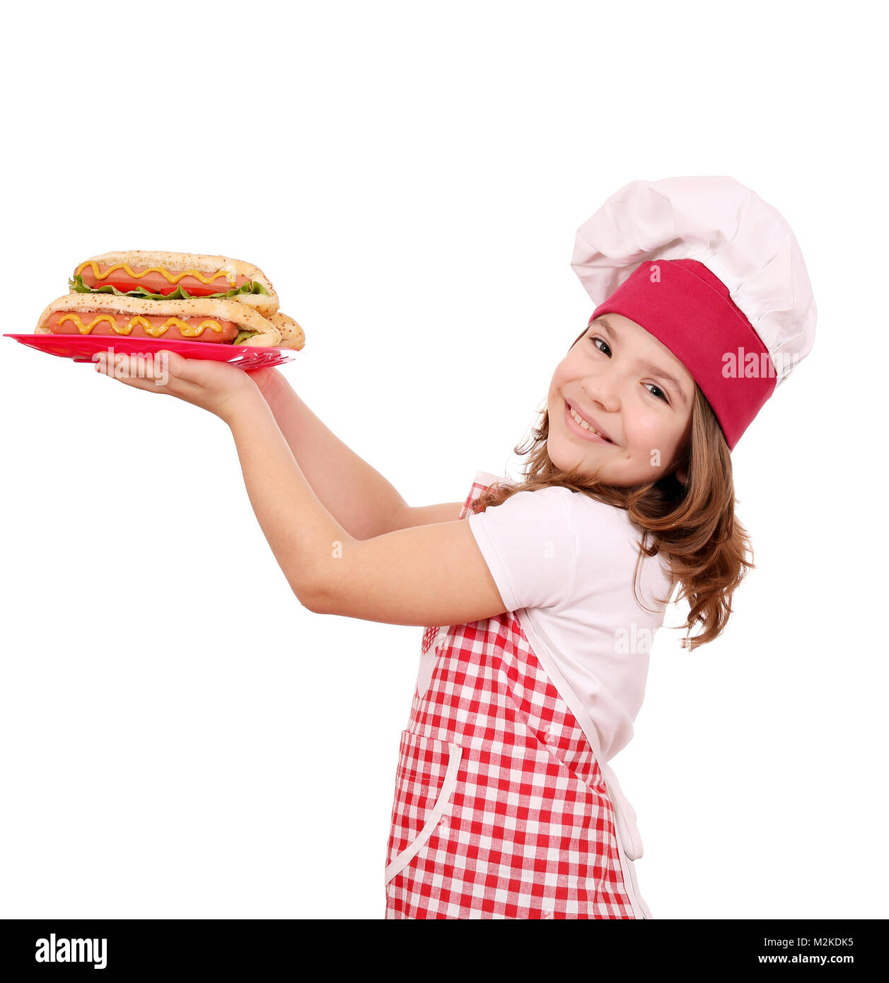 happy little girl cook with hot dogs fast food Stock Photo - Alamy