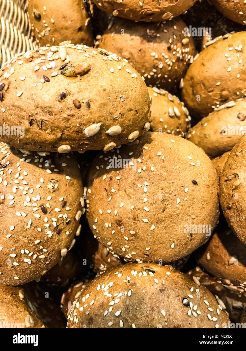 Whole-wheat rye rolls in bread basket Stock Photo - Alamy