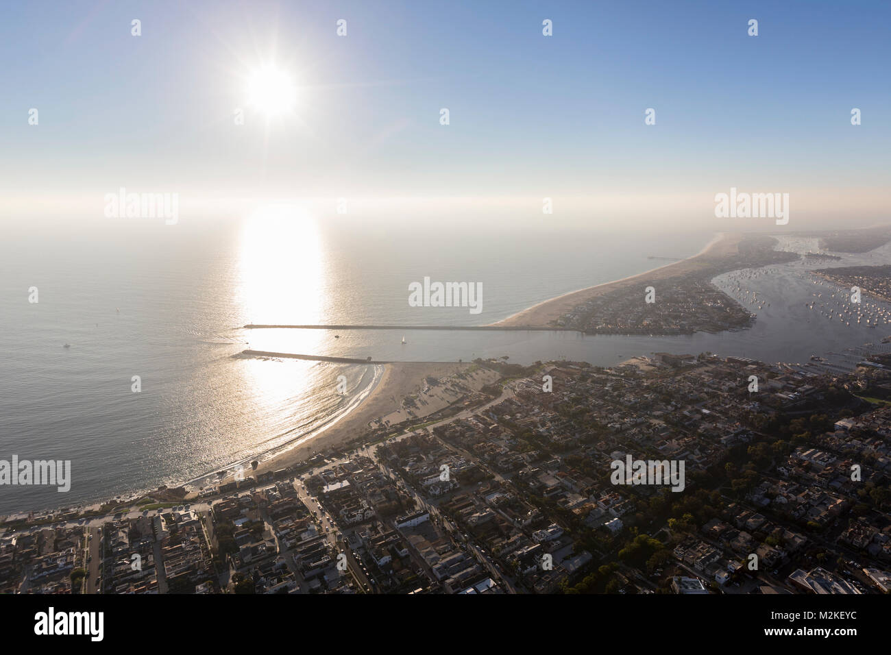 Aerial view of afternoon sun and coastal fog over the entrance to ...