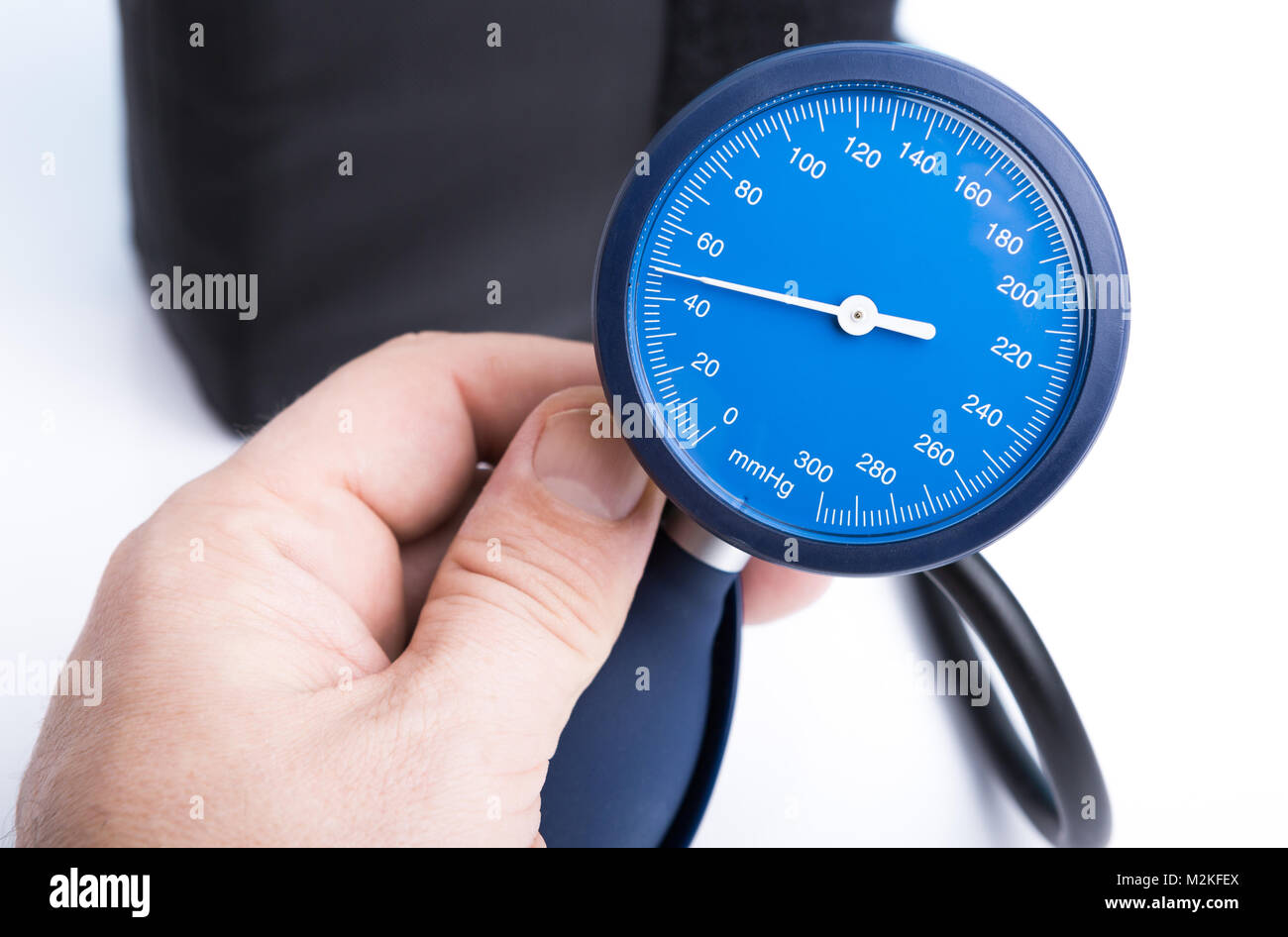 Holding in hand sphygmomanometer isolated on white background Stock ...