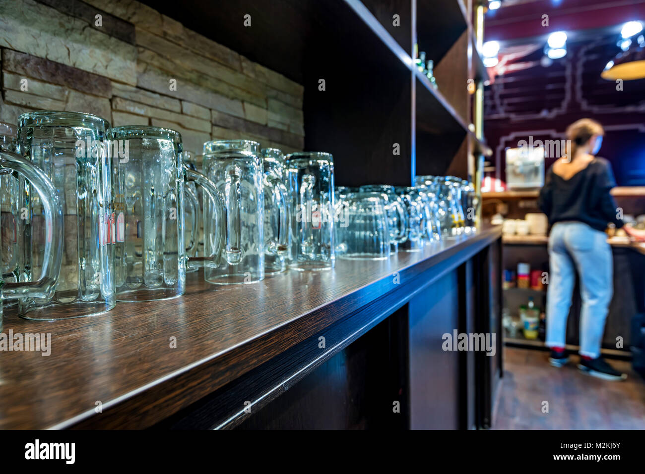Bar shelf with empty beer glasses Stock Photo - Alamy