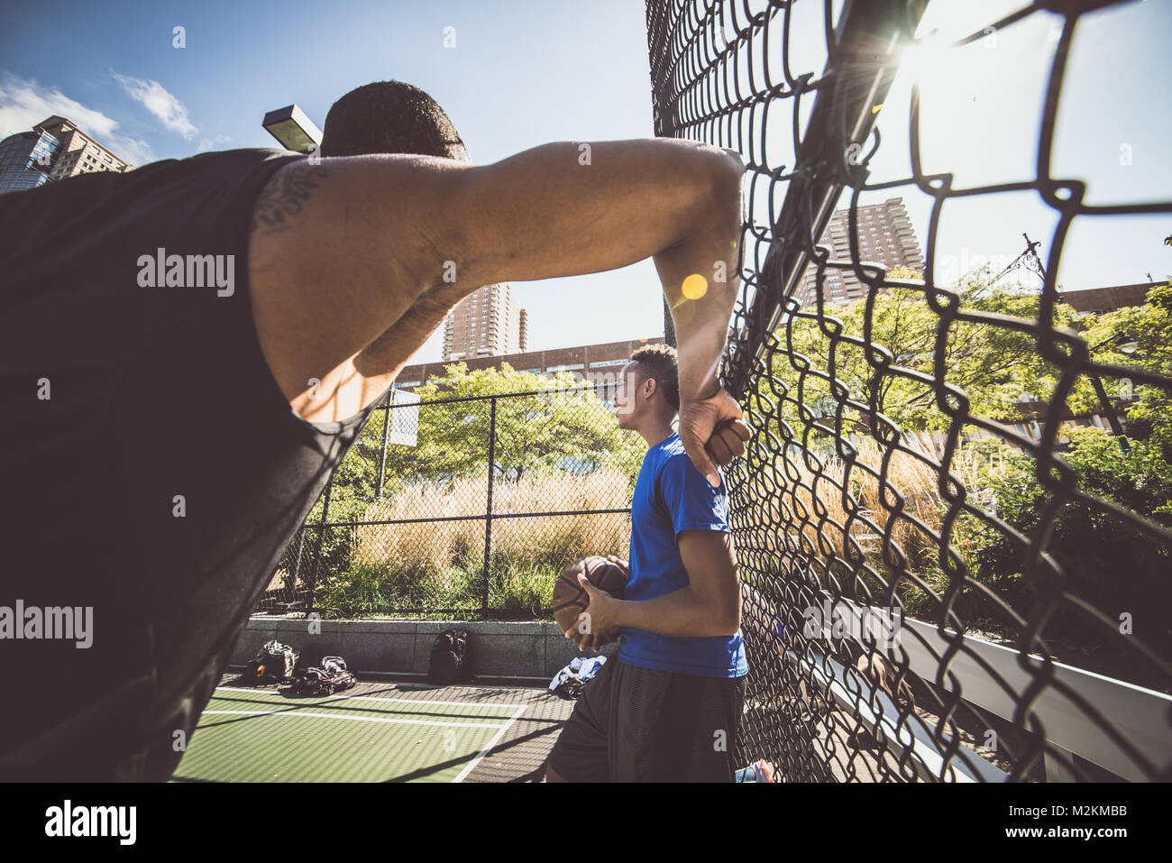 Two basketball players hanging around and having fun Stock Photo - Alamy