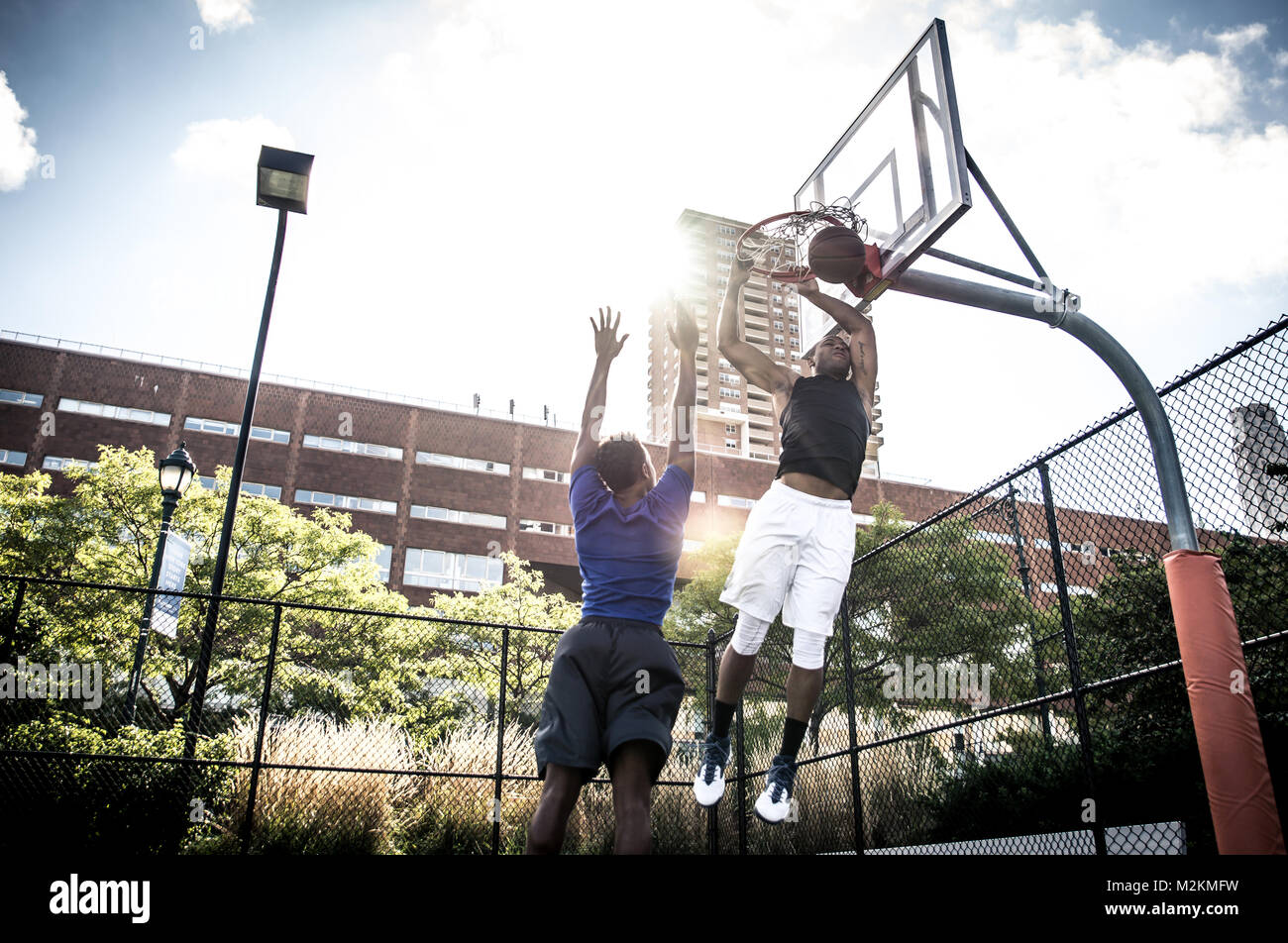Basketball players raised arms hi-res stock photography and images - Alamy