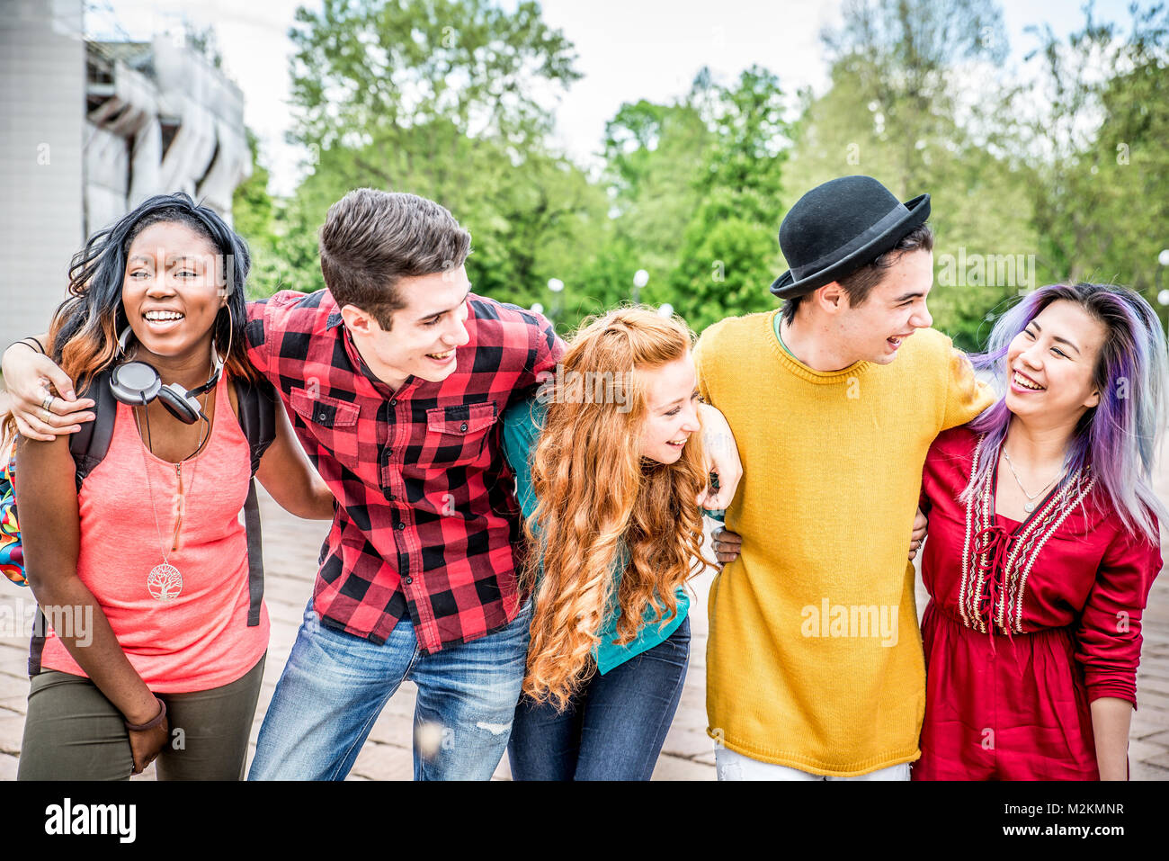 Group of friends laughing out loud outdoor, sharing good and positive ...