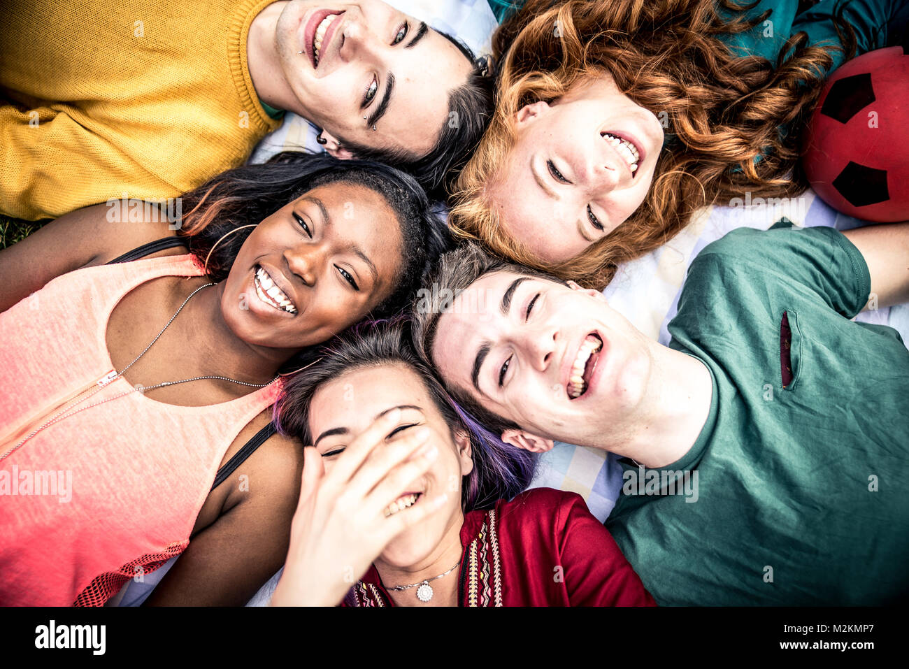 Group of friends laughing out loud outdoor, sharing good and positive ...
