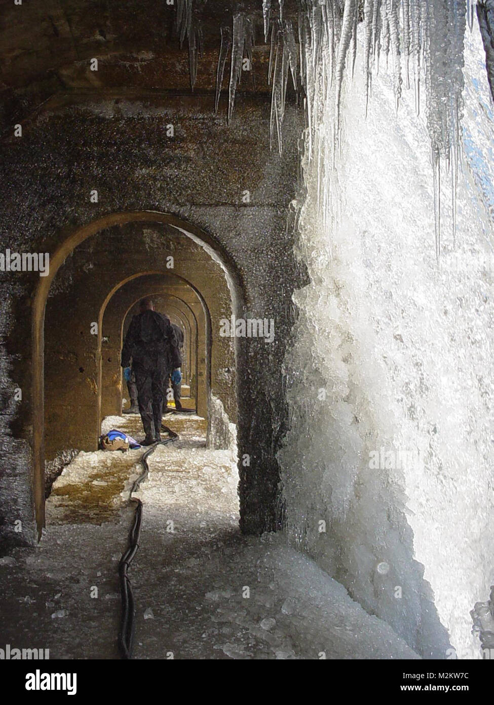 Army engineer divers prepare to enterthe water to gather data as they ...