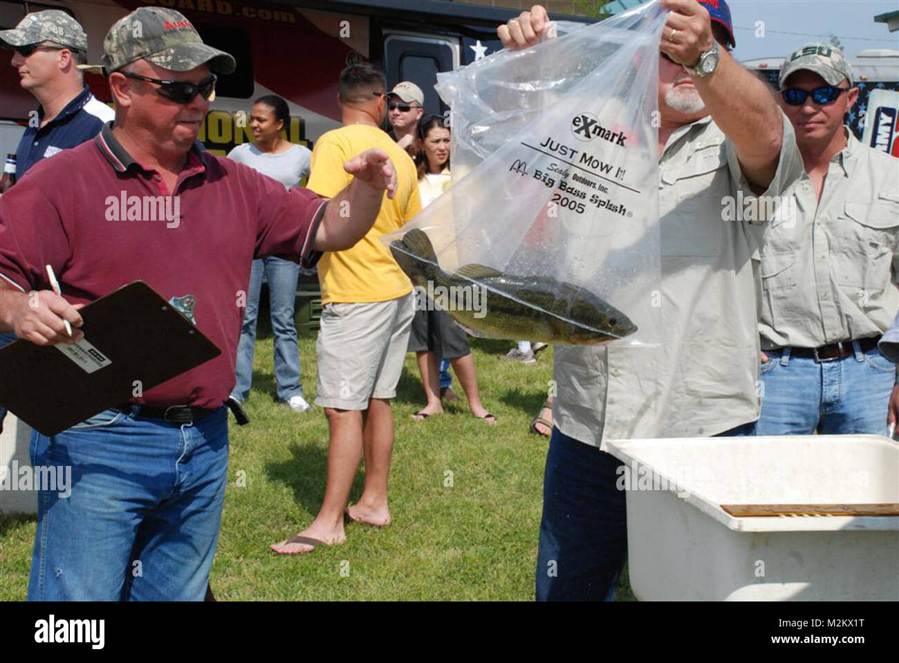 PINEVILLE, La. – Sgt. Maj. James Vicellio checks bass caught at the ...