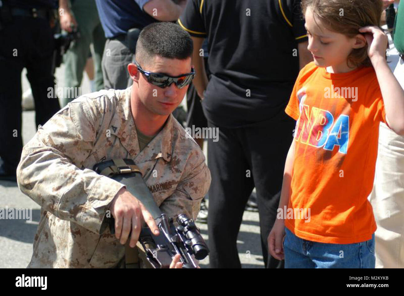 A Marine shows Patrick Bowe of Pelham N.Y, his rifle after the Marines ...