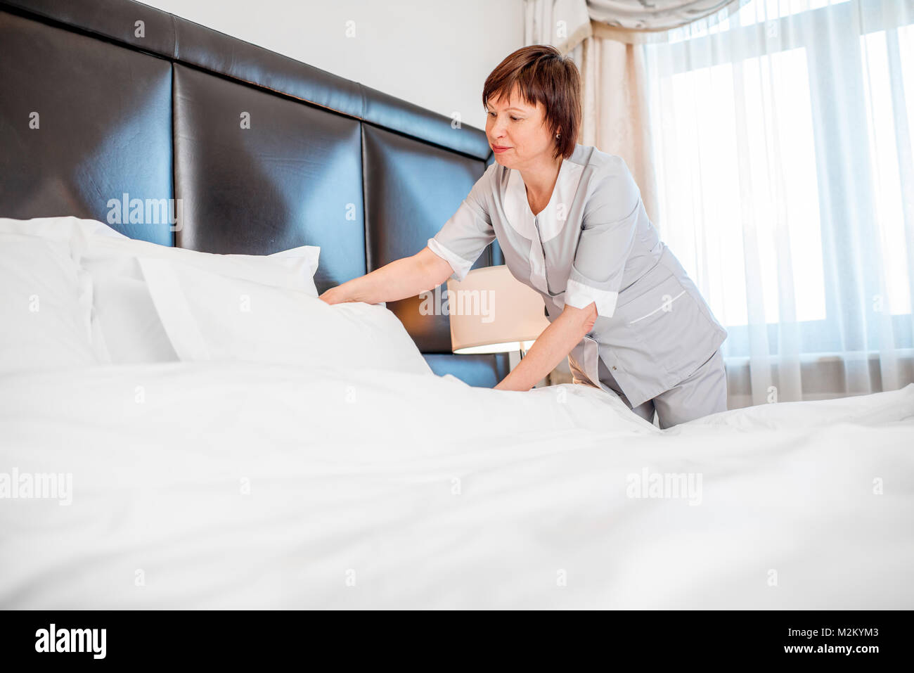 Hotel maid hi-res stock photography and images - Alamy