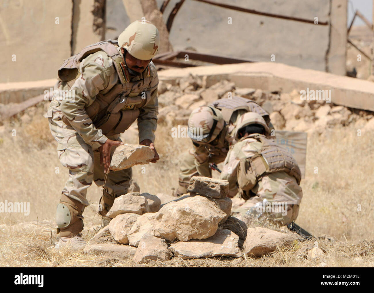 Rock solid cover. CONTINGENCY OPERATING SITE MAREZ, Iraq – Soldiers ...