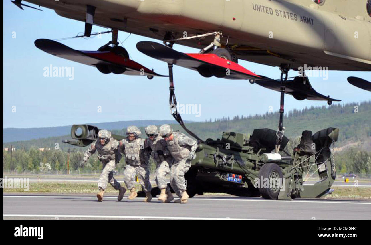 Soldiers from B Battery, 2nd Battalion, 8th Field Artillery Regiment clear the area after ...