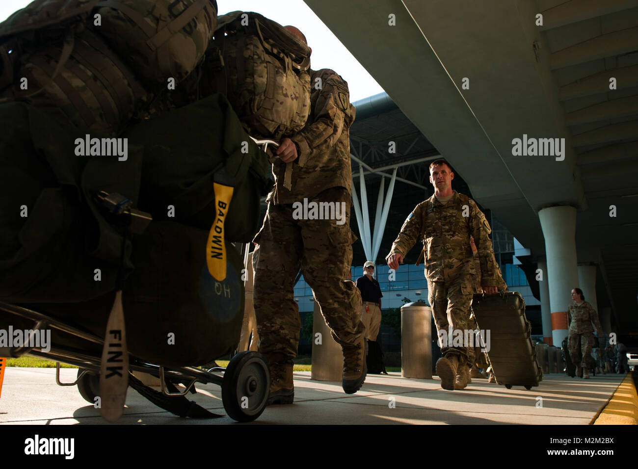 Soldiers of the 4-19th Agribusiness Development Team make their way ...