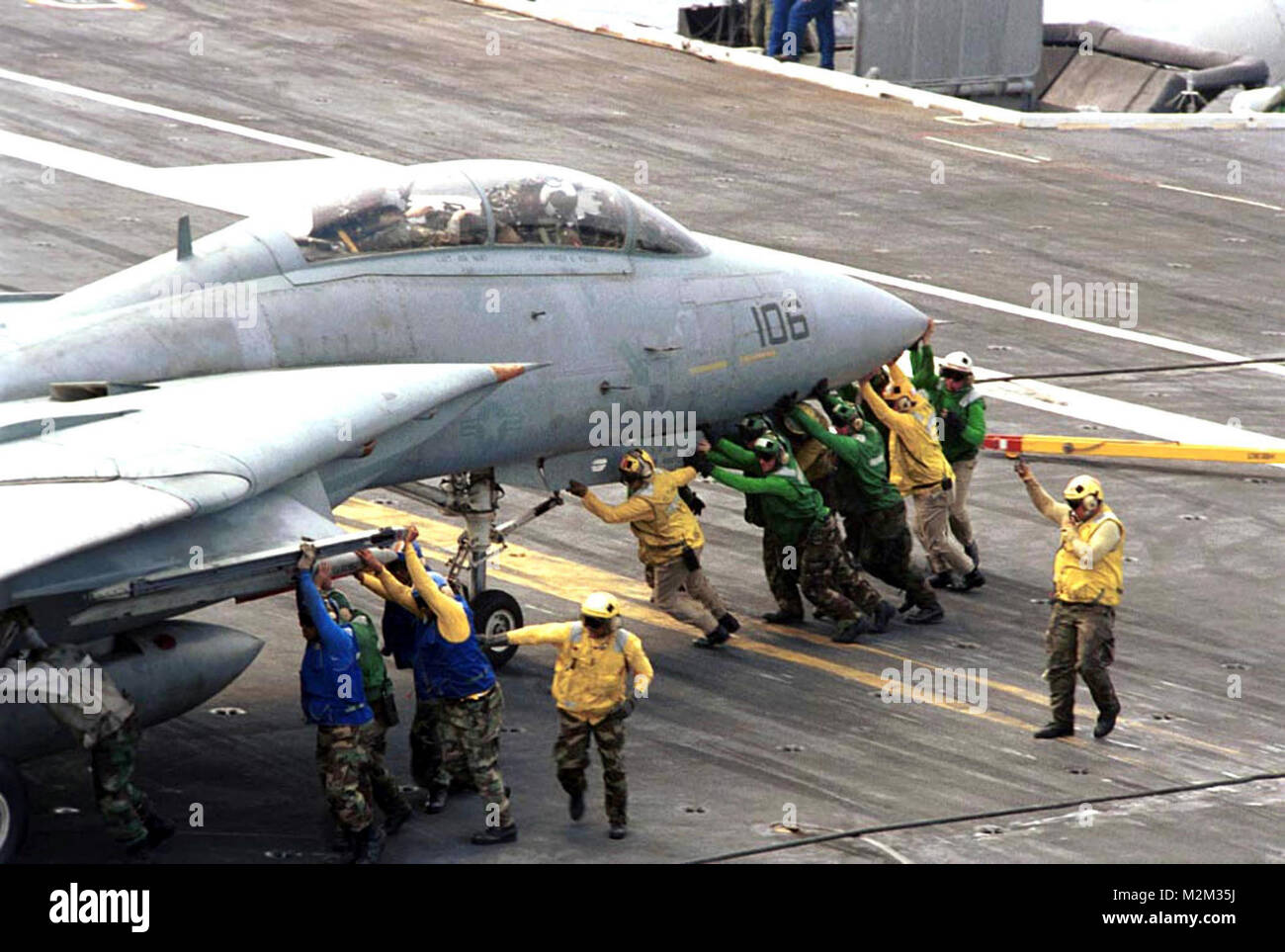 000728-N-1056R-001 ABOARD USS THEODORE ROOSEVELT (July 28, 2000) Ð Flight deck crewmembers ...