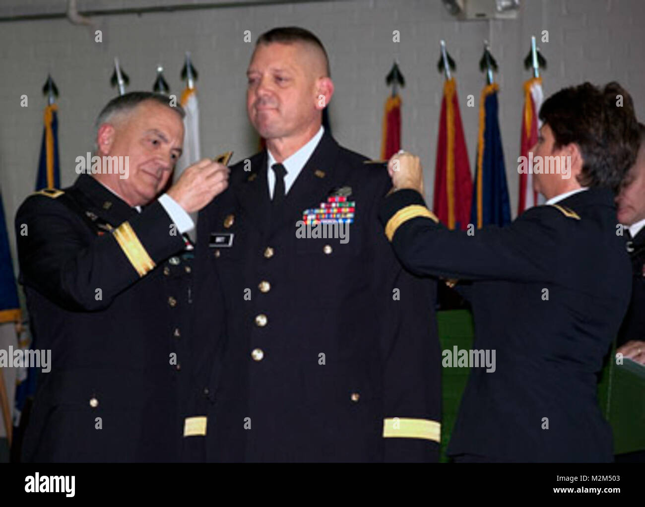 COL(P) Timothy Britt, Director of the Joint Staff, is pinned by the ...