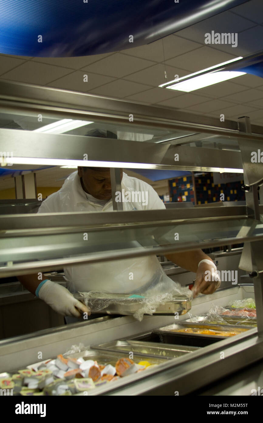 Army Ordnance Dining Facility staff at Fort Lee, Va., prep the serving ...