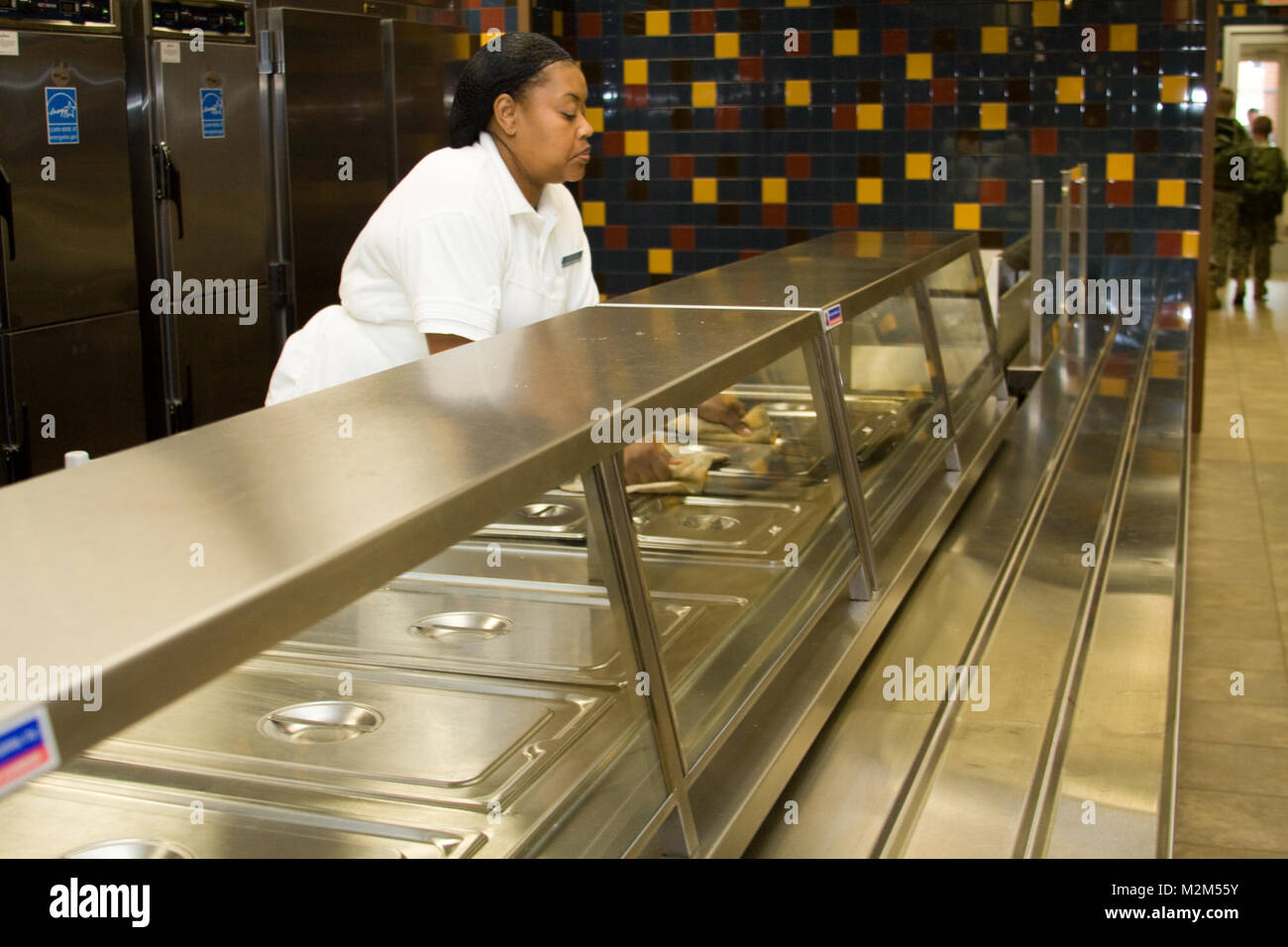 Army Ordnance Dining Facility staff at Fort Lee, Va., prep the serving ...