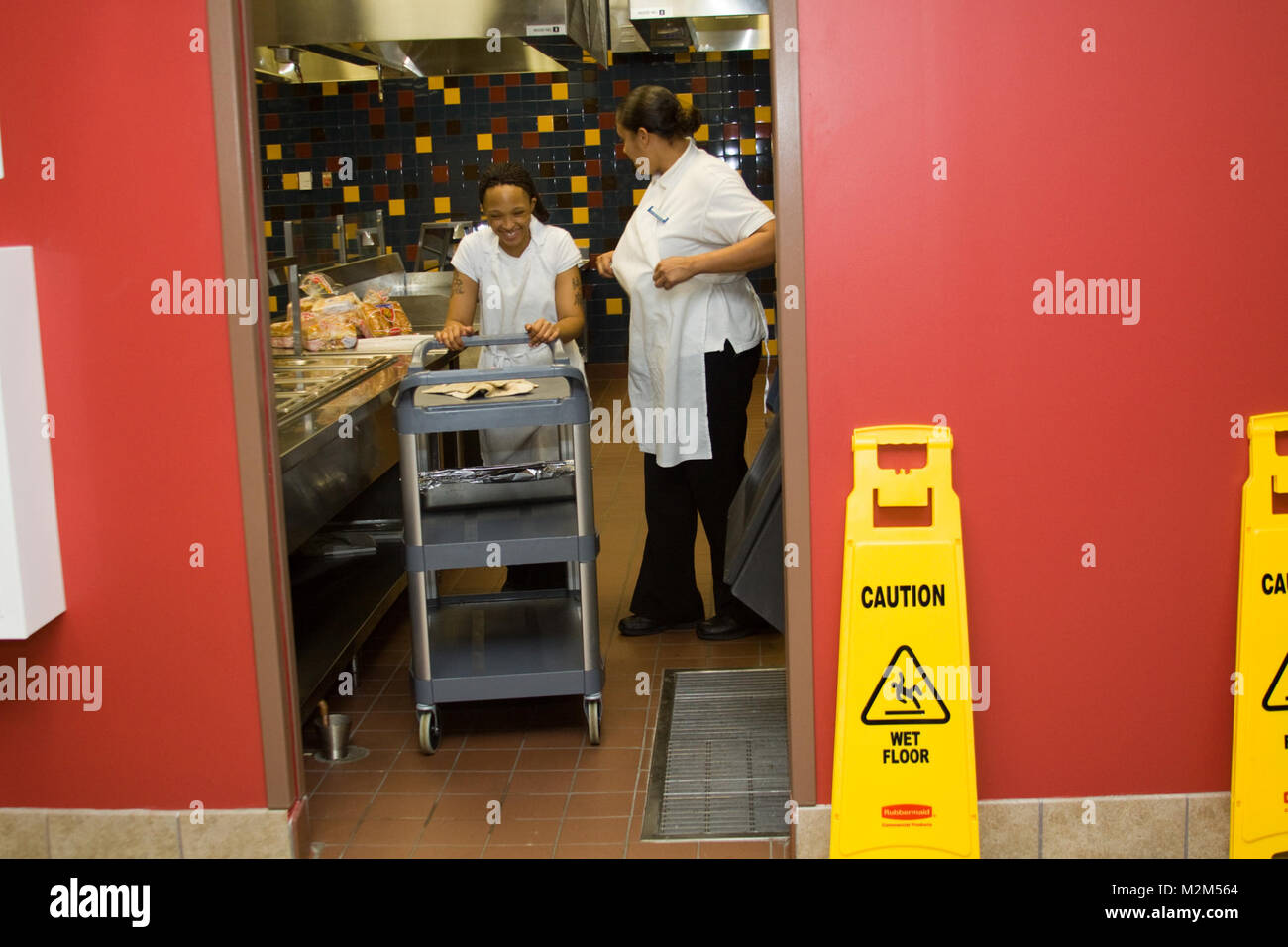 Army Ordnance Dining Facility staff at Fort Lee, Va., prep the serving ...
