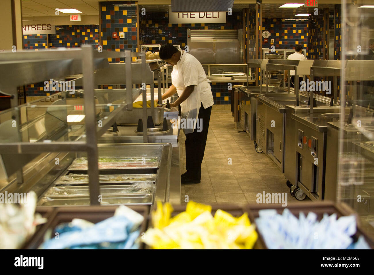 Army Ordnance Dining Facility staff at Fort Lee, Va., prep the serving ...