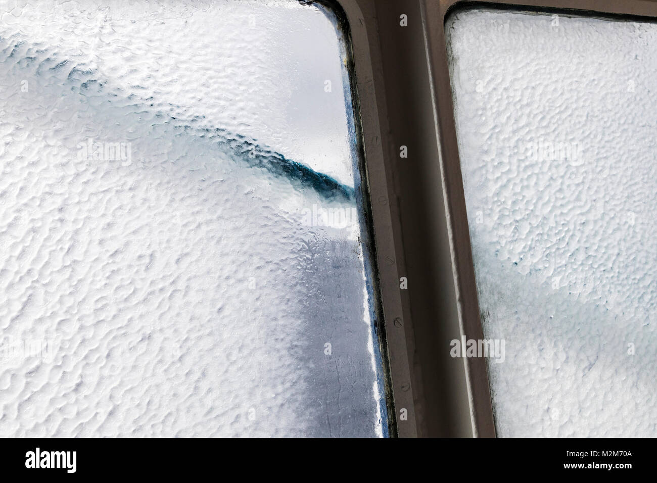 Ice coated windows; passenger ship Ocean Adventurer sails Boyd Strait ...