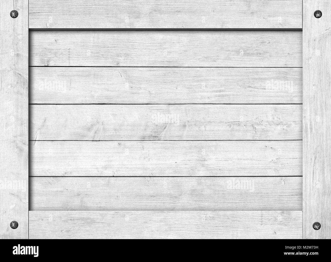 Side of old gray wooden crate, box, planks or frame with screws for ...