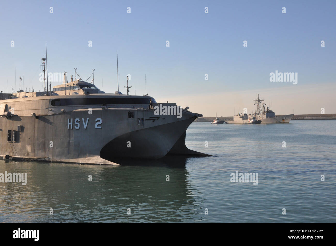 ROTA, Spain -- USS Stephen W. Groves (FFG-29) pulls up alongside High ...