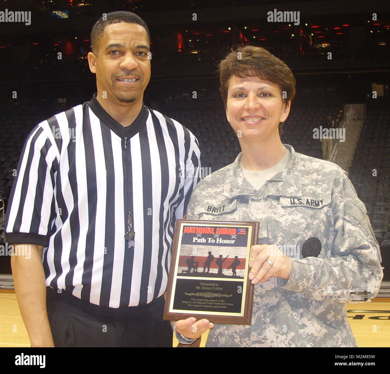 Brig. Gen. Britt presents game officials with token of appreciation by ...