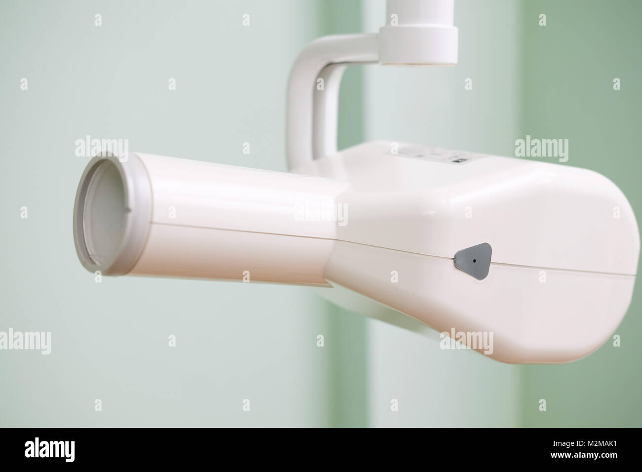 X-ray machine for the diagnosis of teeth, digital X-ray of a patient`s ...