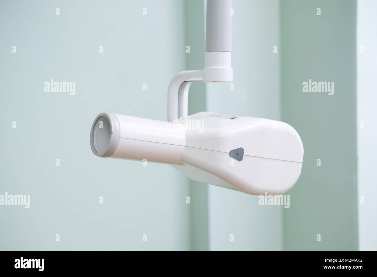 X-ray machine for the diagnosis of teeth, digital X-ray of a patient`s ...