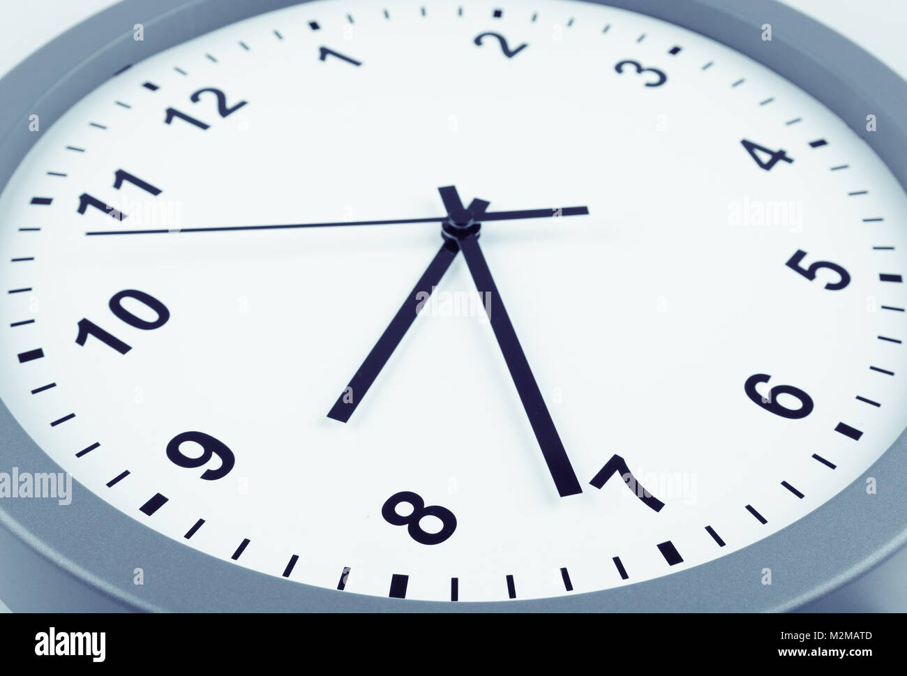 Closeup of hands on clock face Stock Photo - Alamy