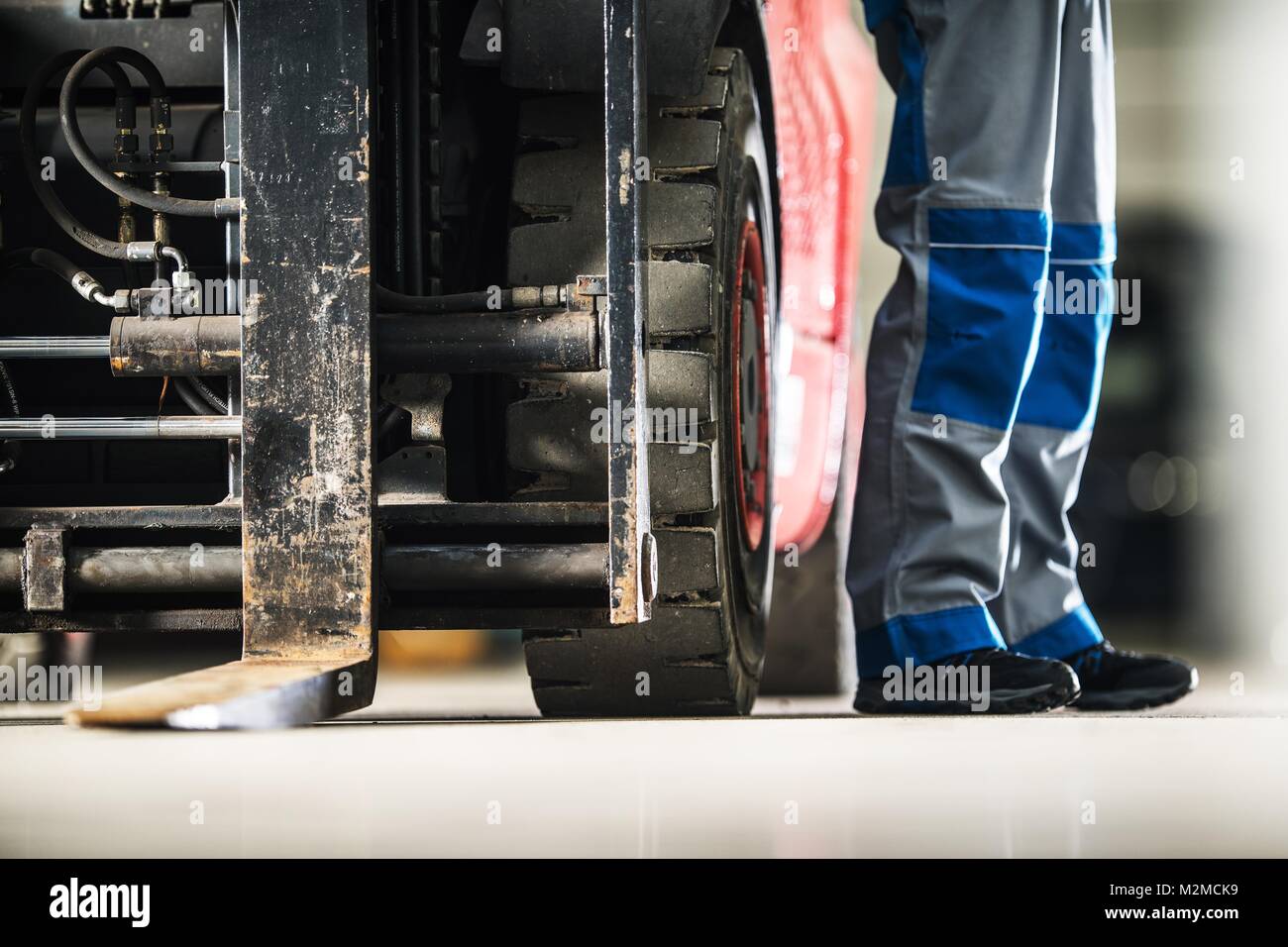 Operating Forklift Truck. Men and the Machine. Professional Lift Truck ...