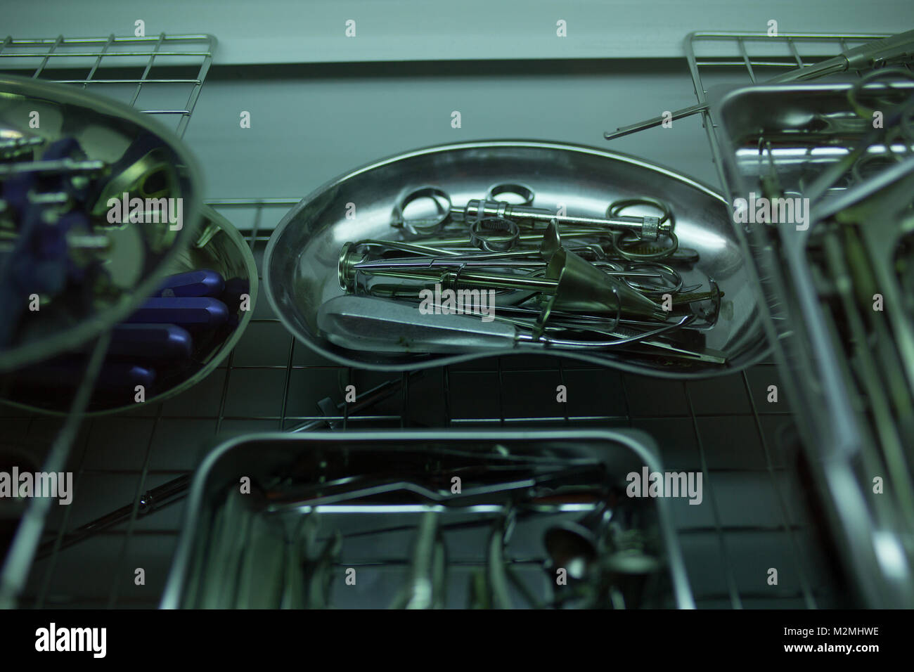 set of sterile medical instruments in clinic or hospital. medicine ...