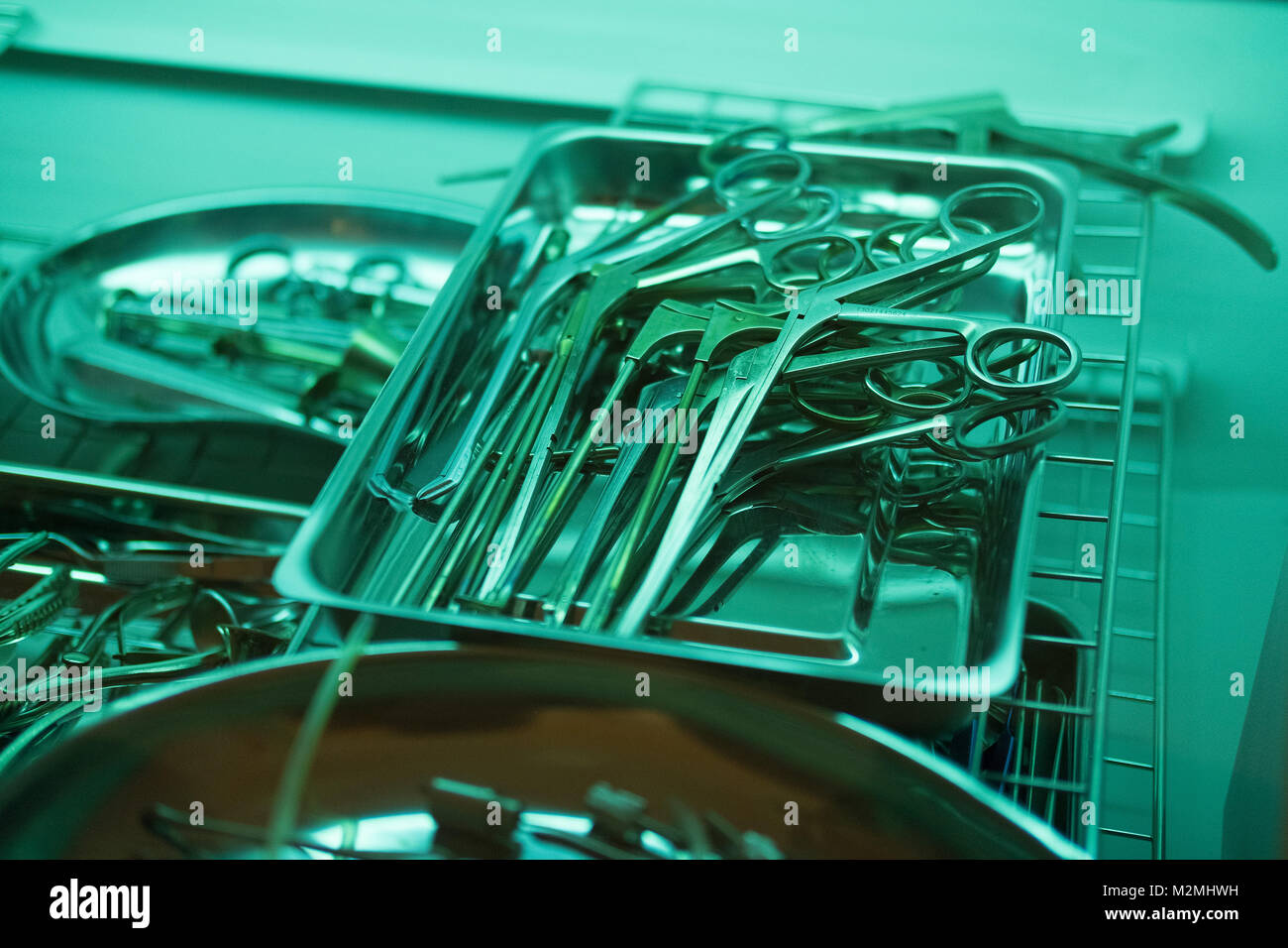 set of sterile medical instruments in clinic or hospital. medicine ...