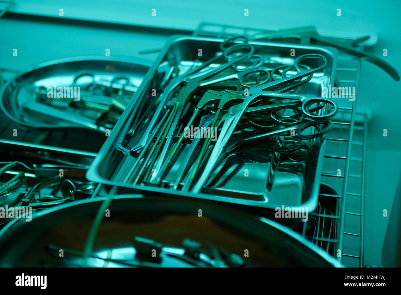 set of sterile medical instruments in clinic or hospital. medicine ...