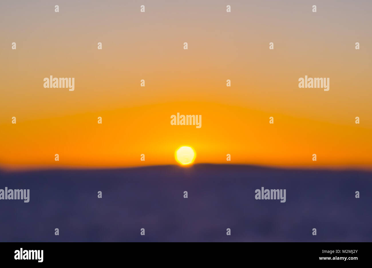 Colorful Sunset Blur, expressionistic style, with centered setting sun ...