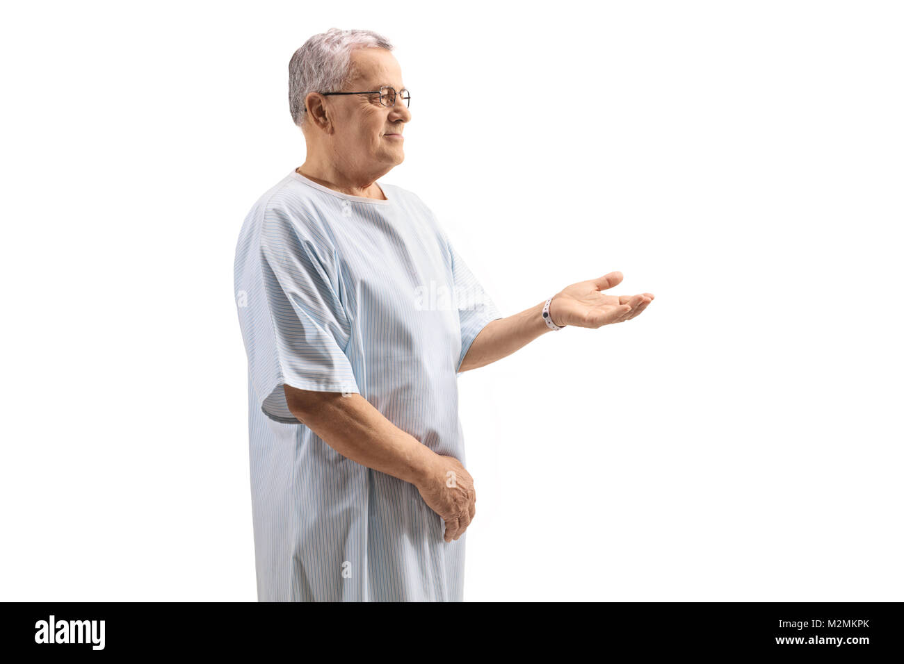 Elderly patient gesturing with his hand isolated on white background ...
